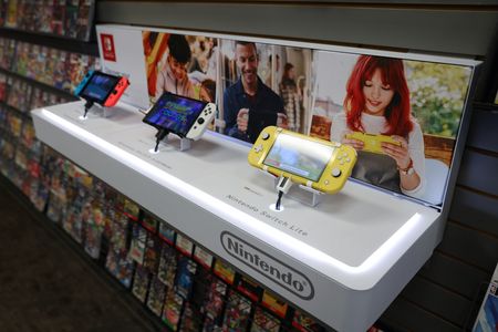 Nintendo announces 10-1 stock split; sees Switch sales falling 9% ...